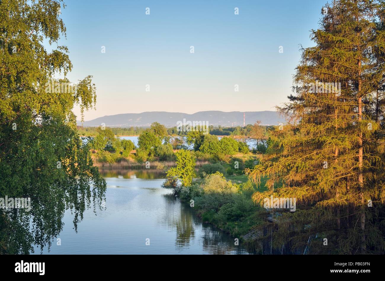 Spring evening landscape. Beautiful lakes and mountains in the ...