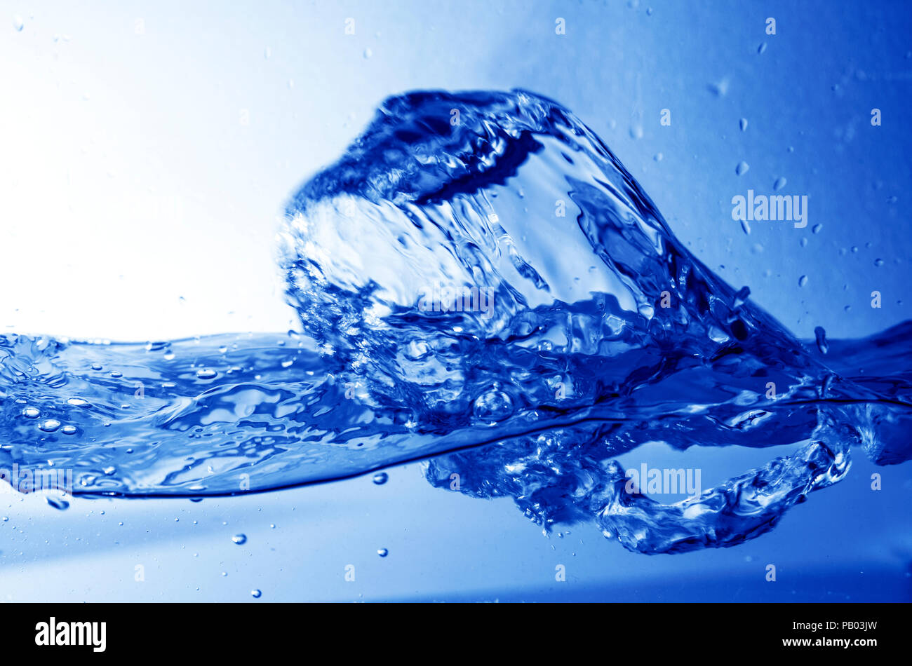 Fresh water splash in blue color. Purity concept Stock Photo - Alamy