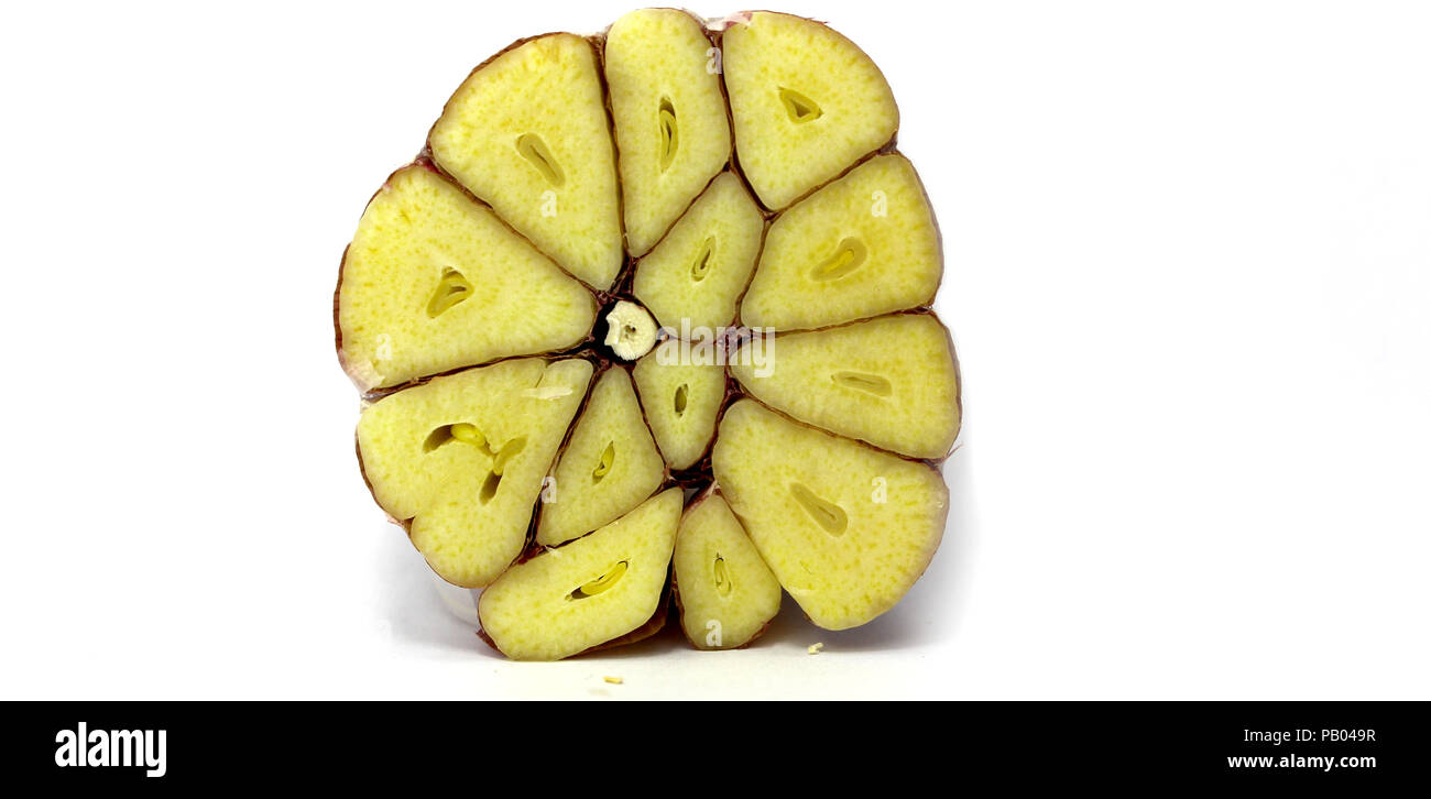 halved garlic from middle east sliced slice isolated and close up on ...