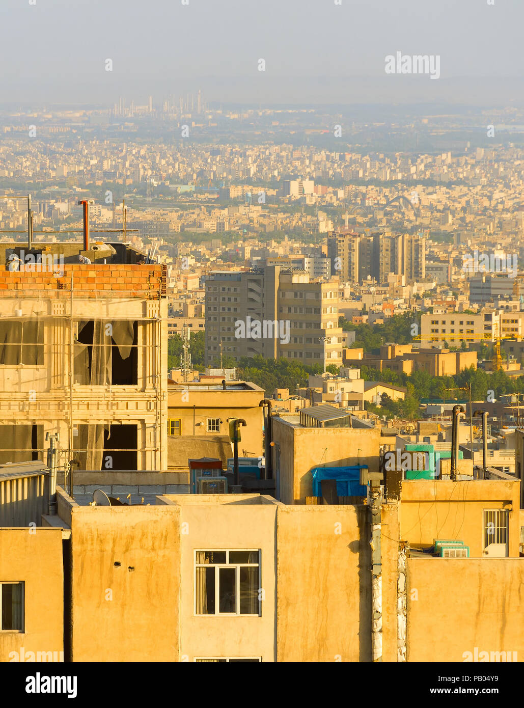 Skyline of Tehran with residential building in the foreground. Iran ...