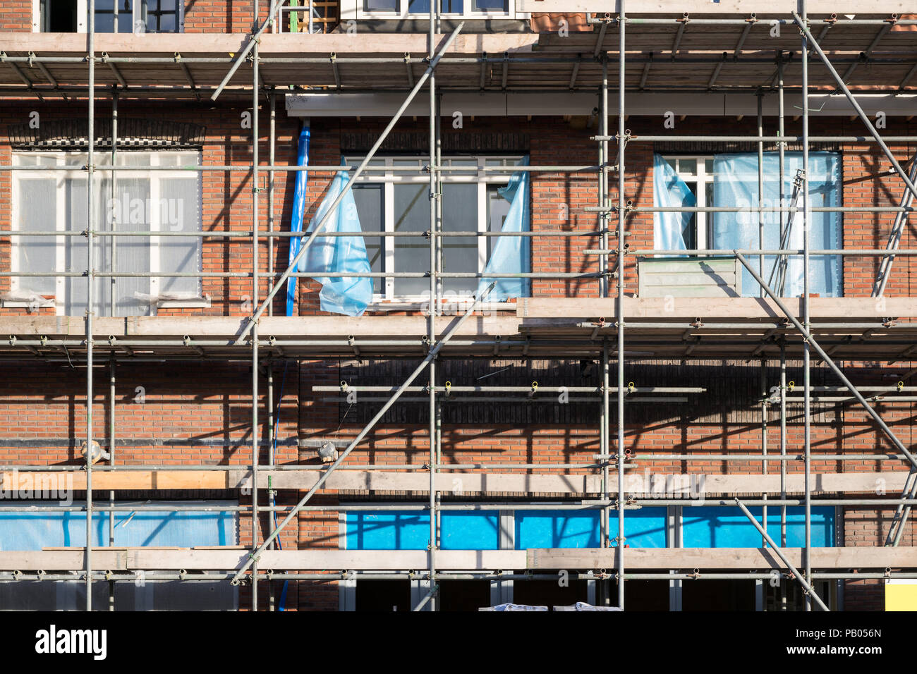 scaffolding at a residential building currently under construction ...