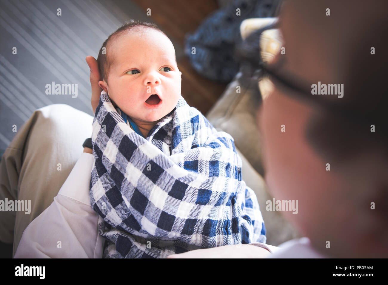 Swaddled in blanket hi-res stock photography and images - Alamy
