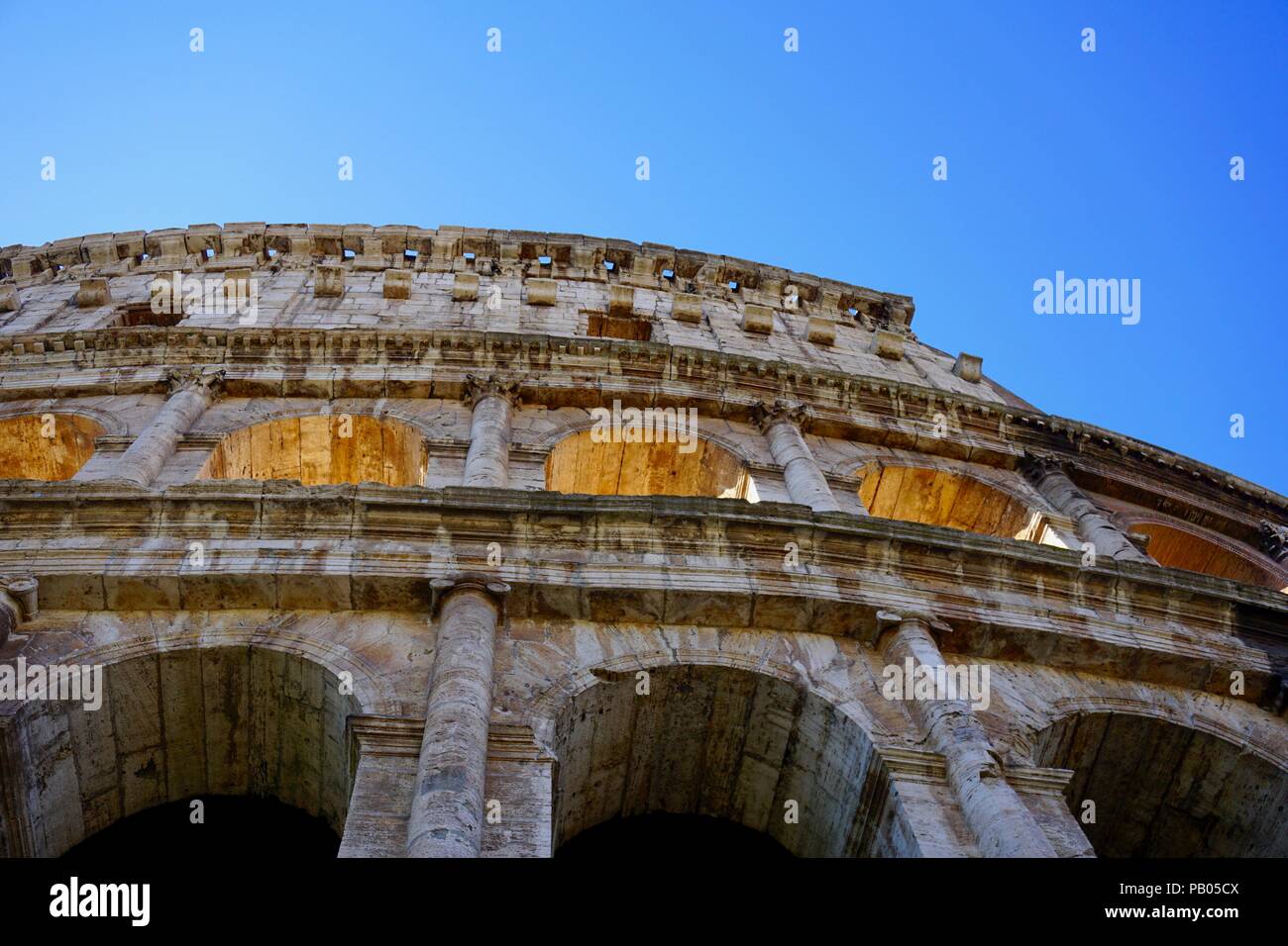 Sun on a Italian colosseum Stock Photo - Alamy