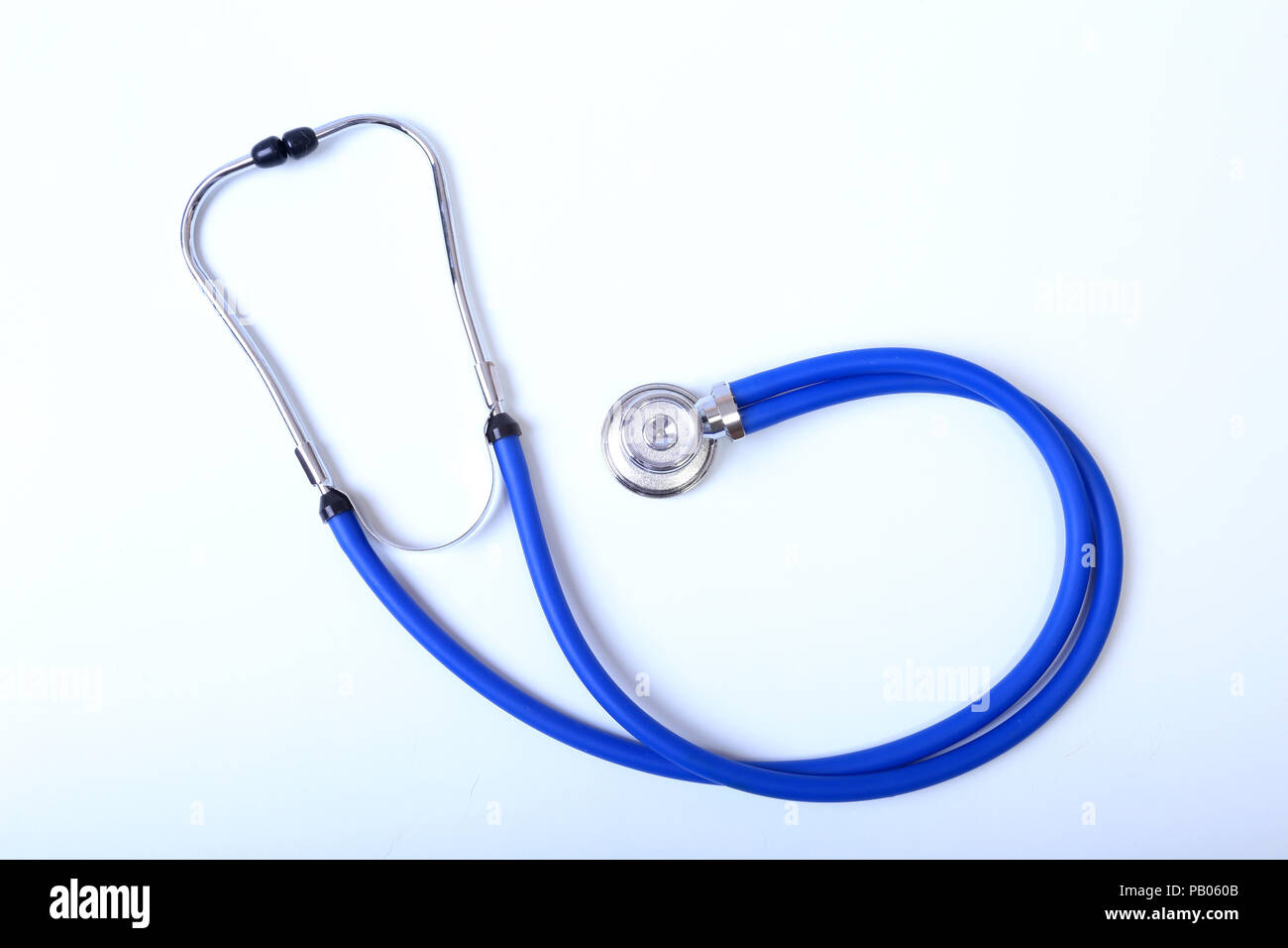 Medical blue stethoscope isolated on white background Stock Photo - Alamy