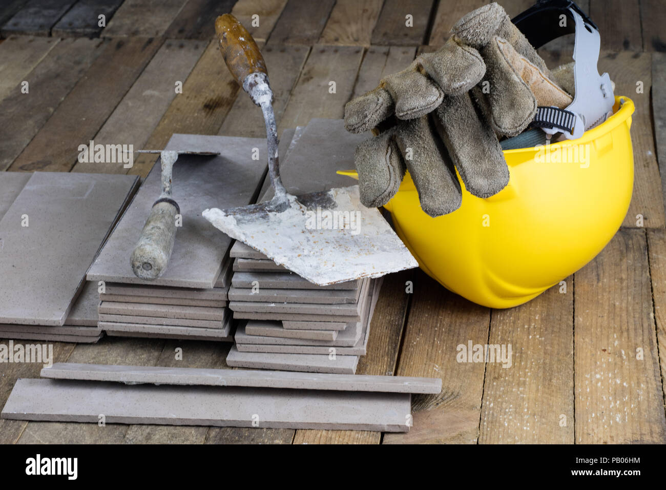 Helmet, tiles and tools for the builder. Accessories for construction ...