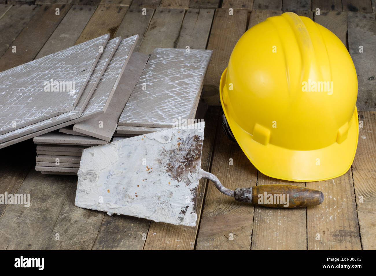 Helmet, tiles and tools for the builder. Accessories for construction ...