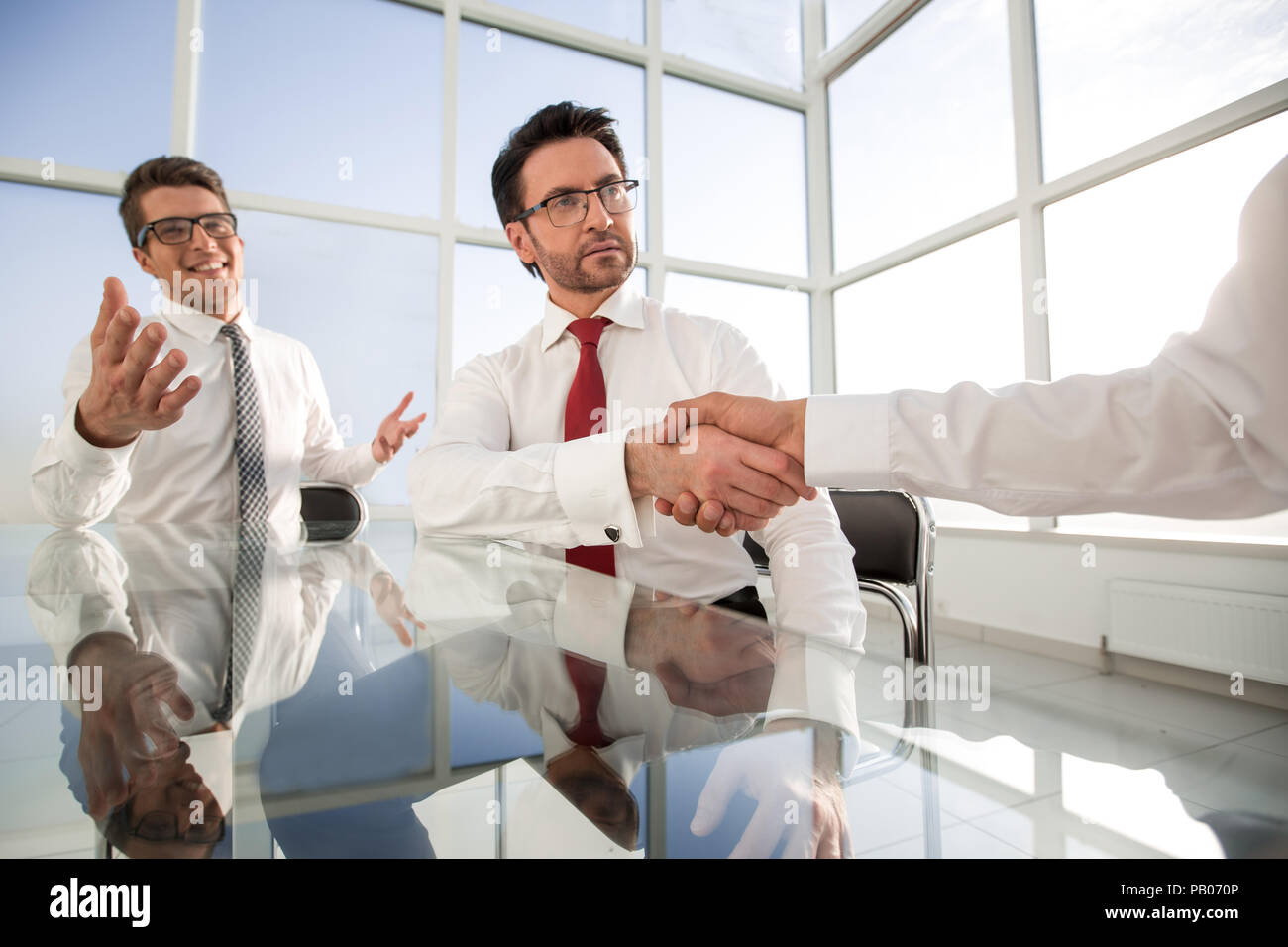 business partners shaking hands Stock Photo - Alamy