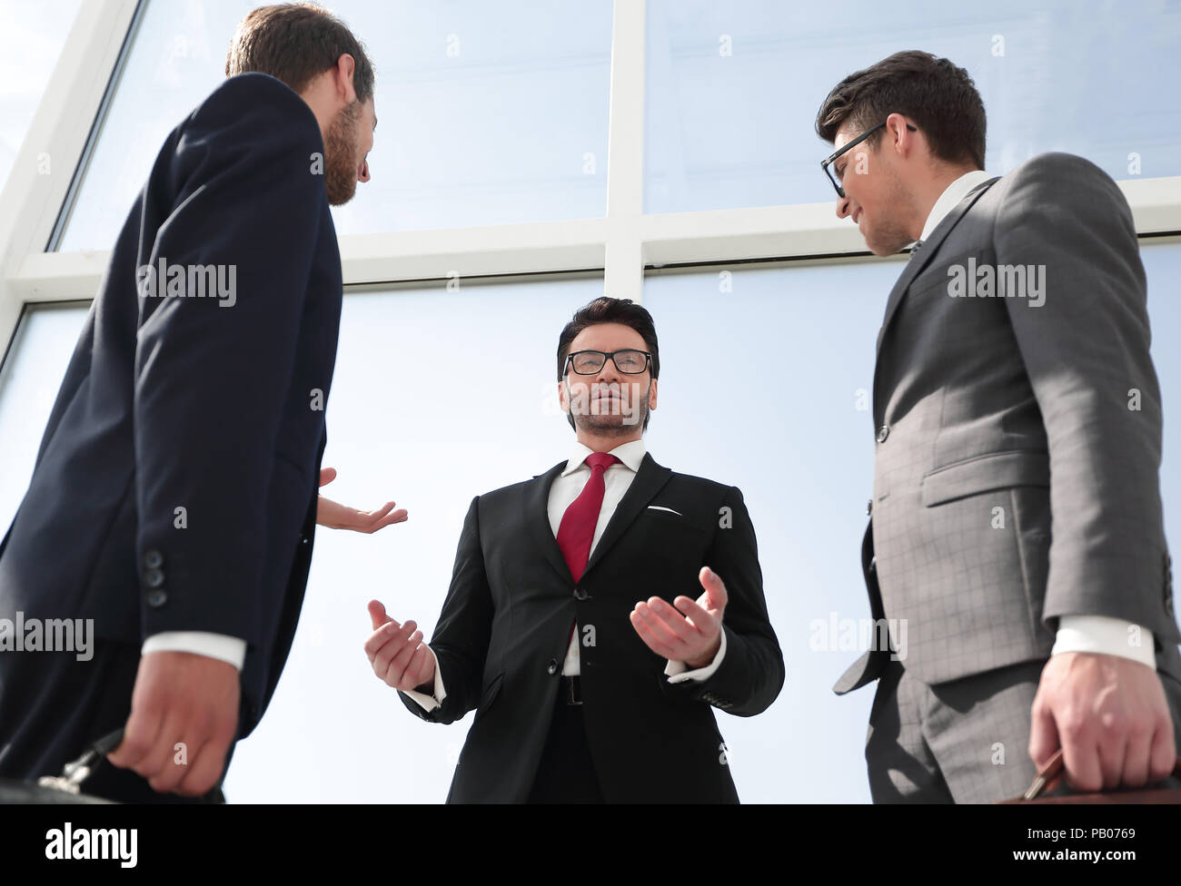 bottom view.a group of business people discussing business problems ...