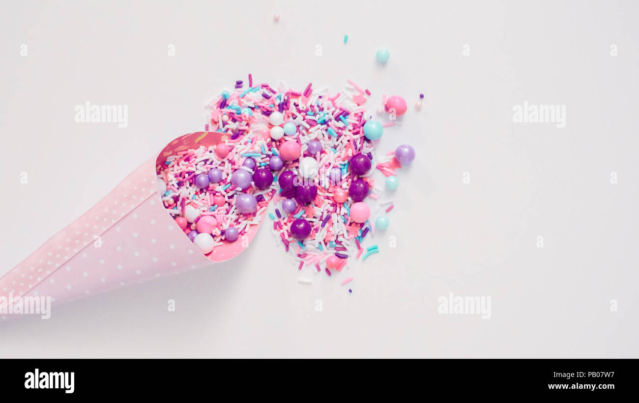 Colorful purple sprinkle blend on a white background Stock Photo - Alamy