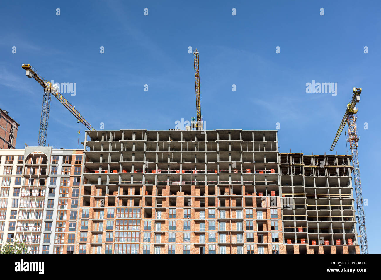 Scaffolding high rise building new construction hi-res stock ...