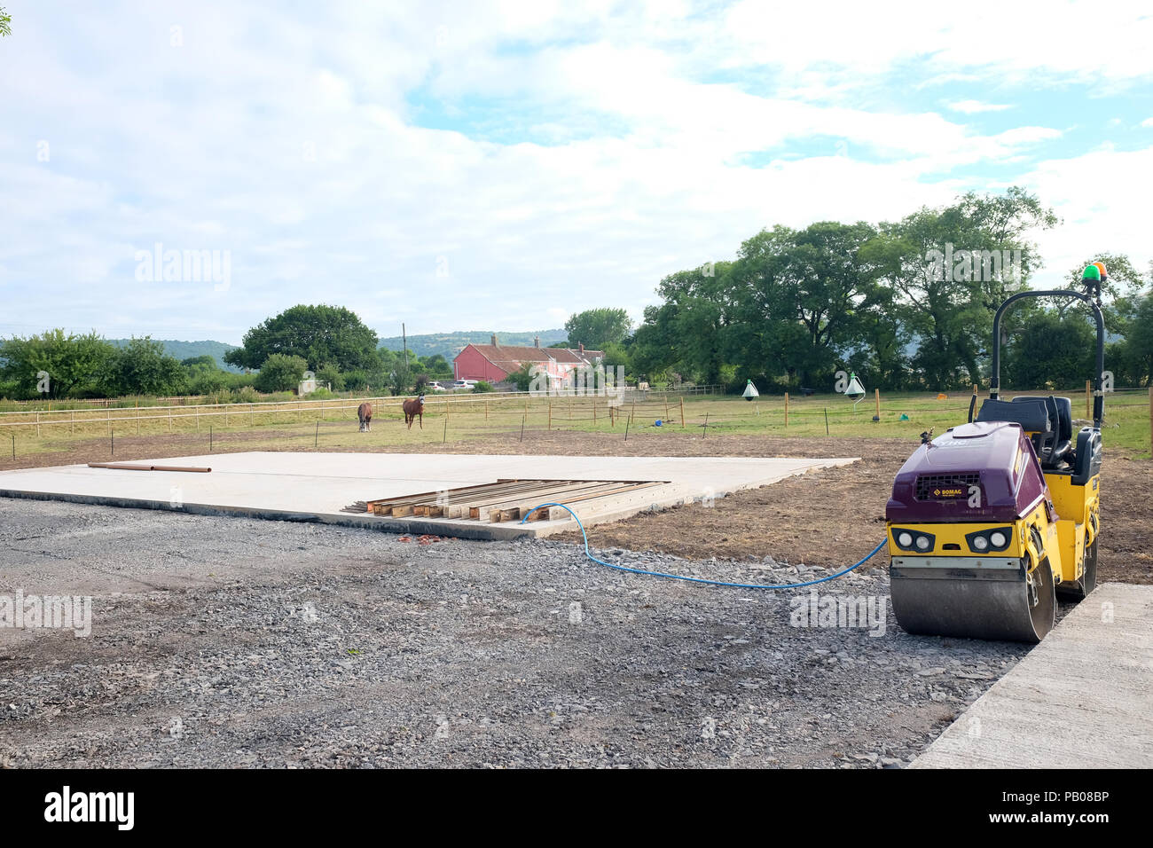 July 2018 - Construction plant on a site forming the base of new stable ...
