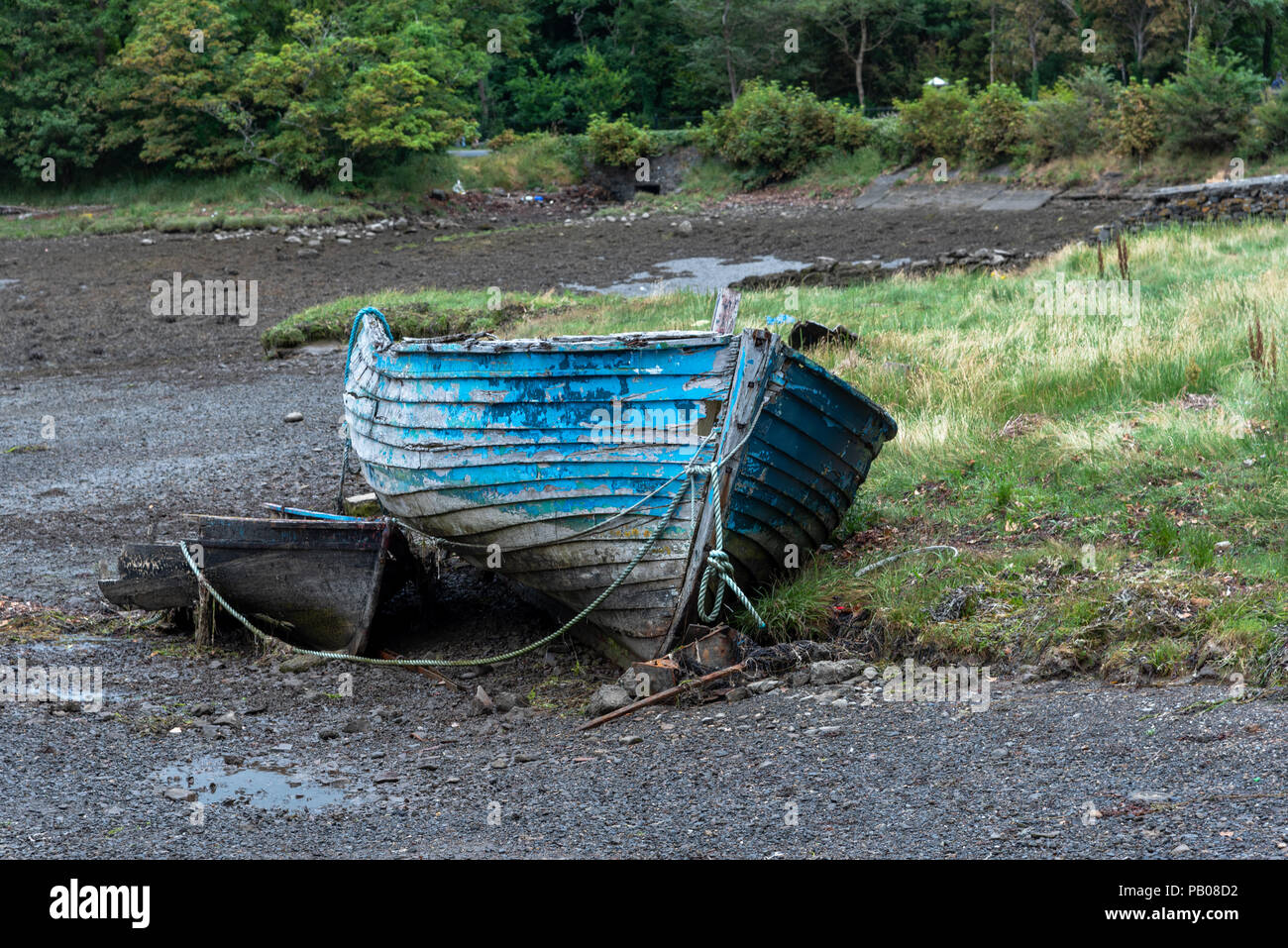 An old rowboat, abandoned on the dried up river bank Stock Photo - Alamy