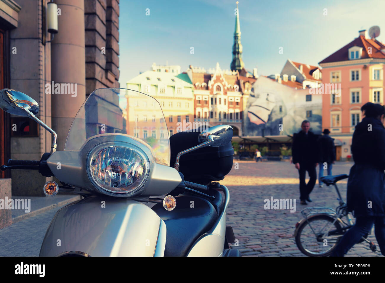 Scooter stands on the central square in Riga on a sunny autumn day on ...
