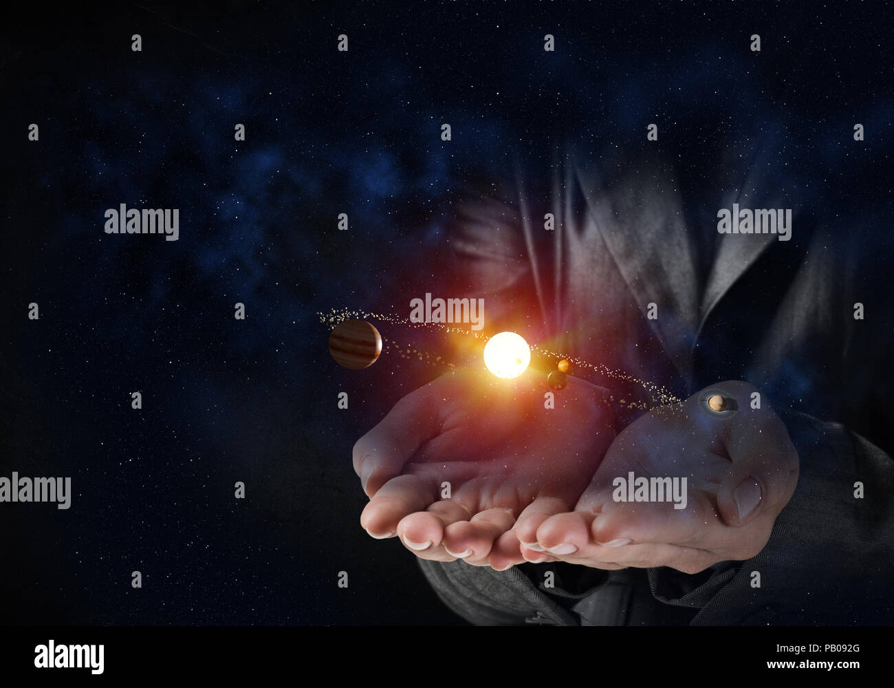 Hands and solar system planets hi-res stock photography and images - Alamy