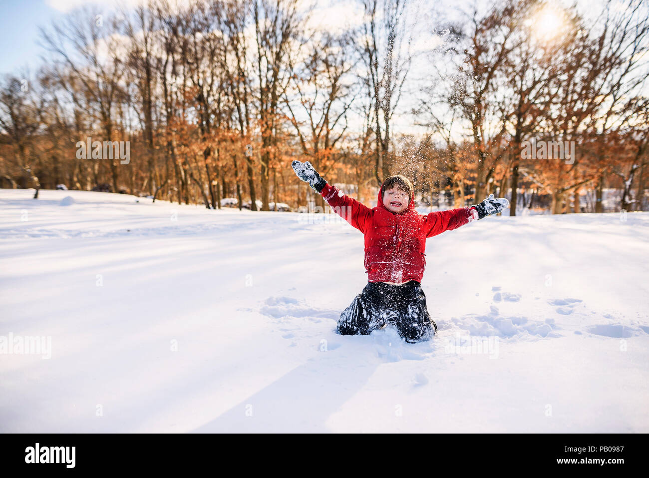 Person kneeling with arm raised hi-res stock photography and images - Alamy