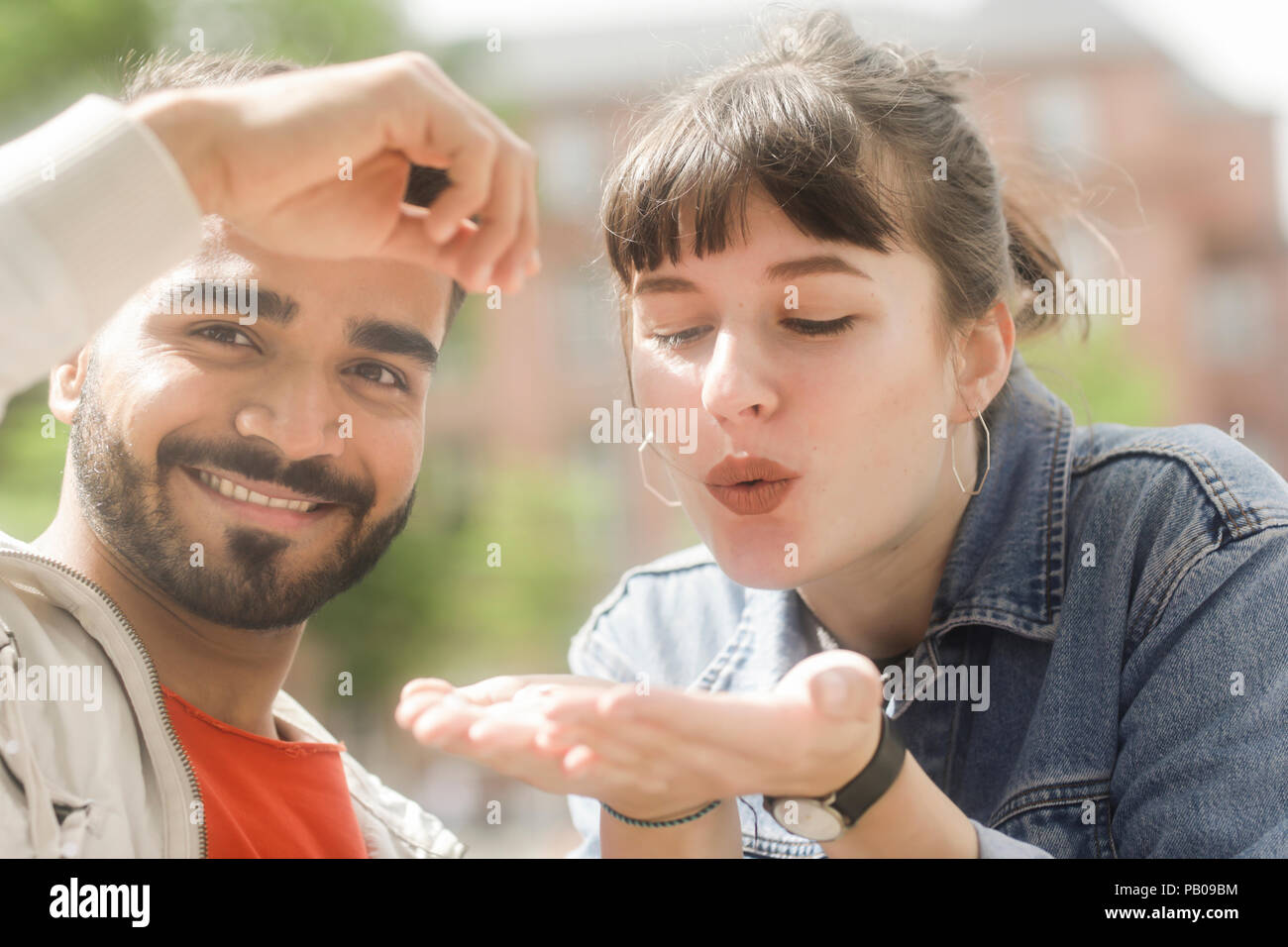 Blowing two people hi-res stock photography and images - Alamy
