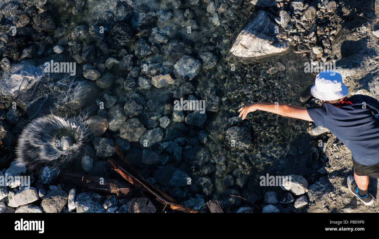 Rock throwing hi-res stock photography and images - Alamy
