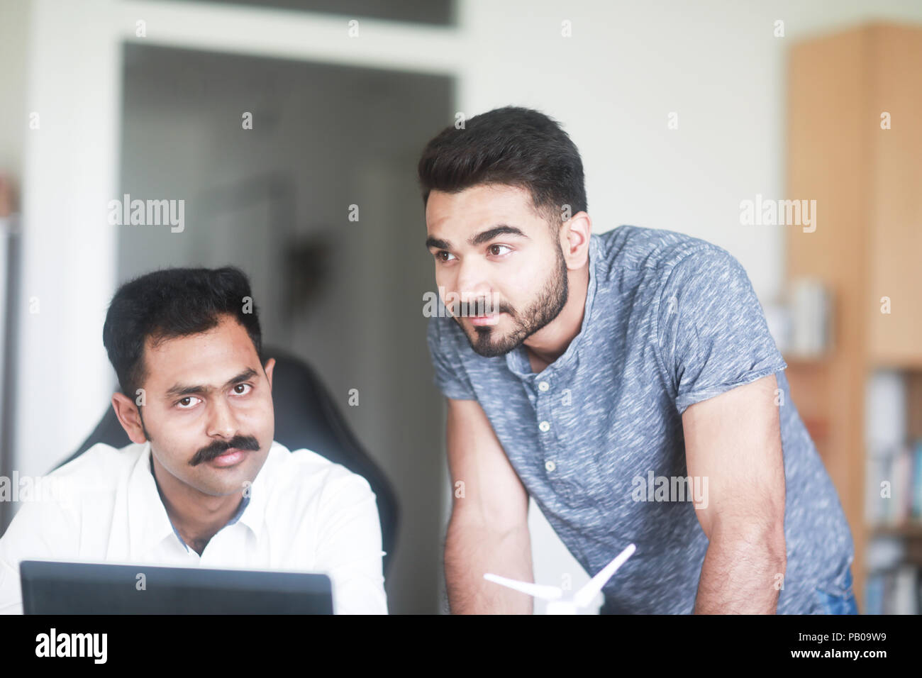 Two men at home hi-res stock photography and images - Alamy