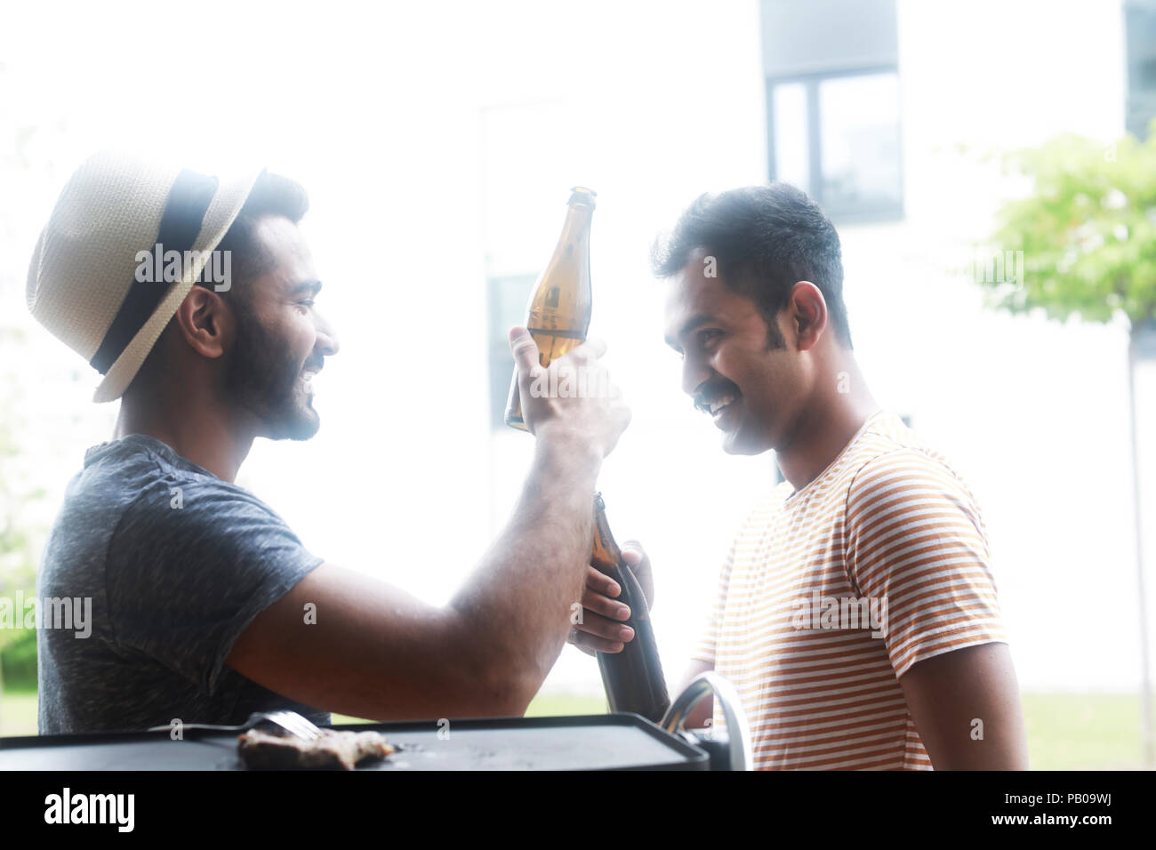 Two men drinking beer hi-res stock photography and images - Alamy