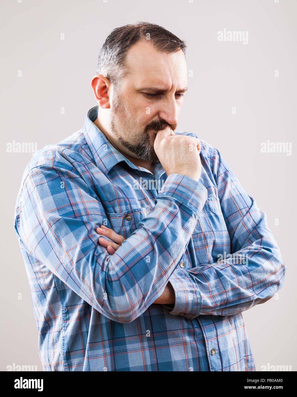 Portrait of worried man Stock Photo - Alamy