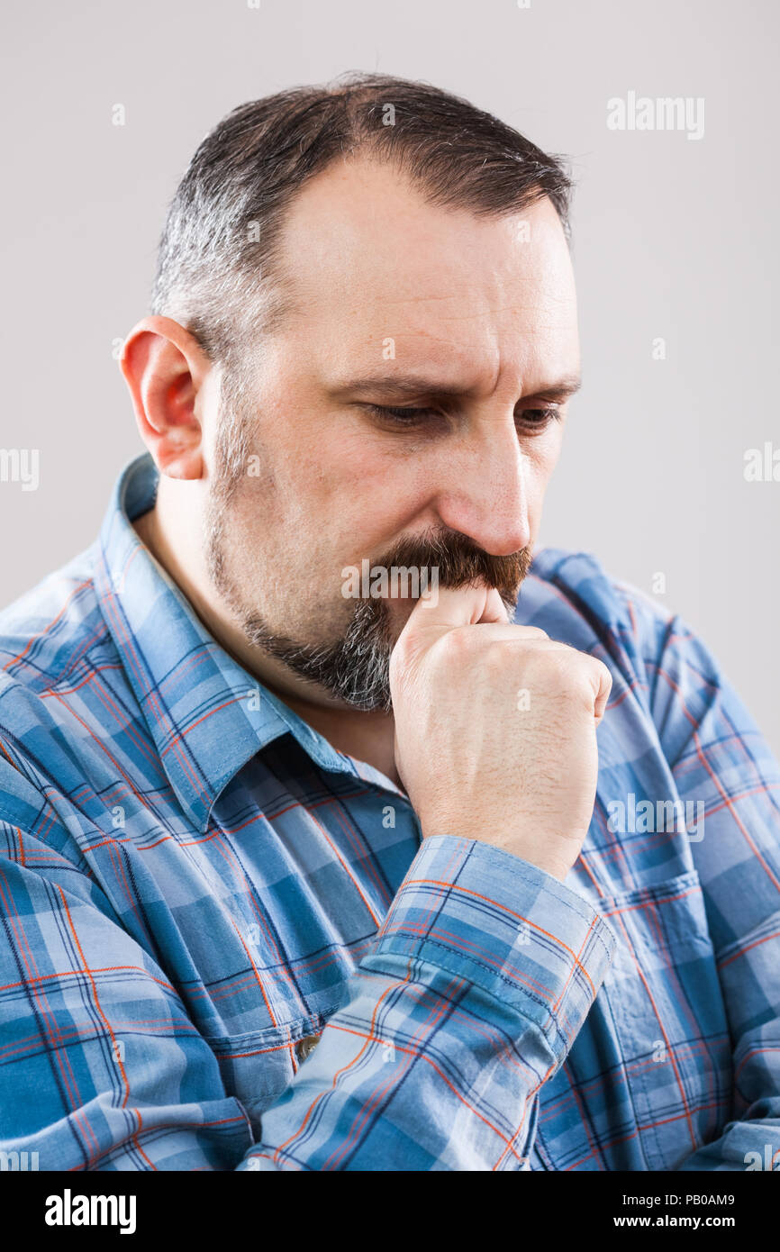Portrait of worried man Stock Photo - Alamy
