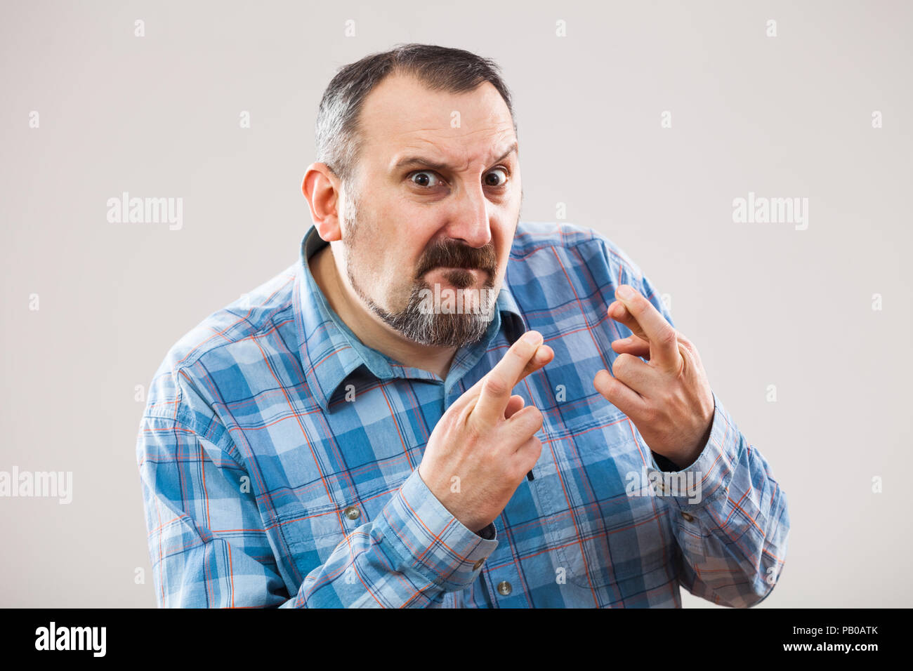 Hand fingers crossed male hi-res stock photography and images - Alamy