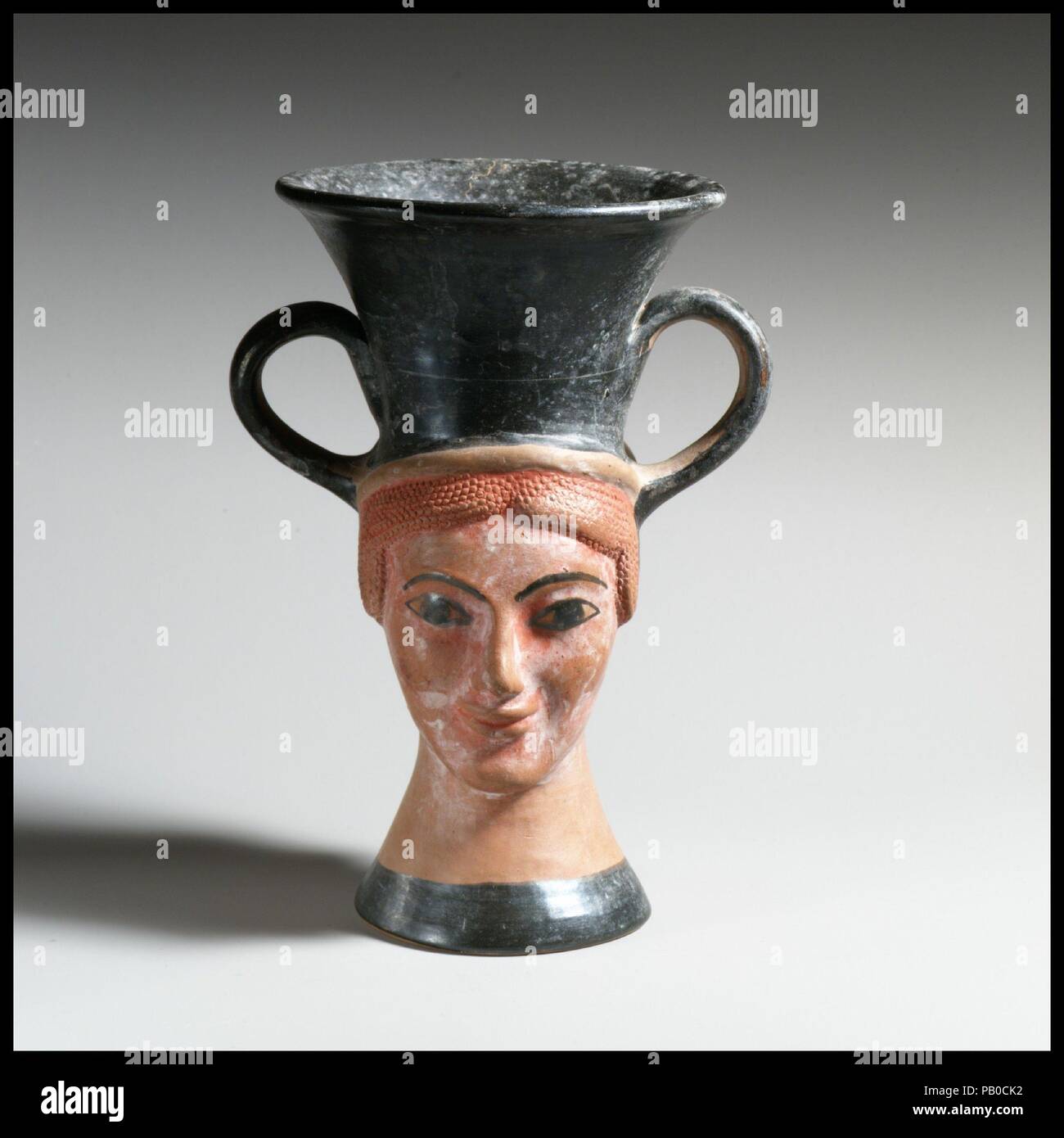 Kantharos in the form of two heads. Culture: Greek, South Italian ...