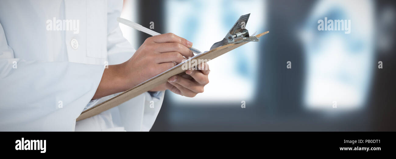 Composite image of doctor writing on clipboard against white background ...