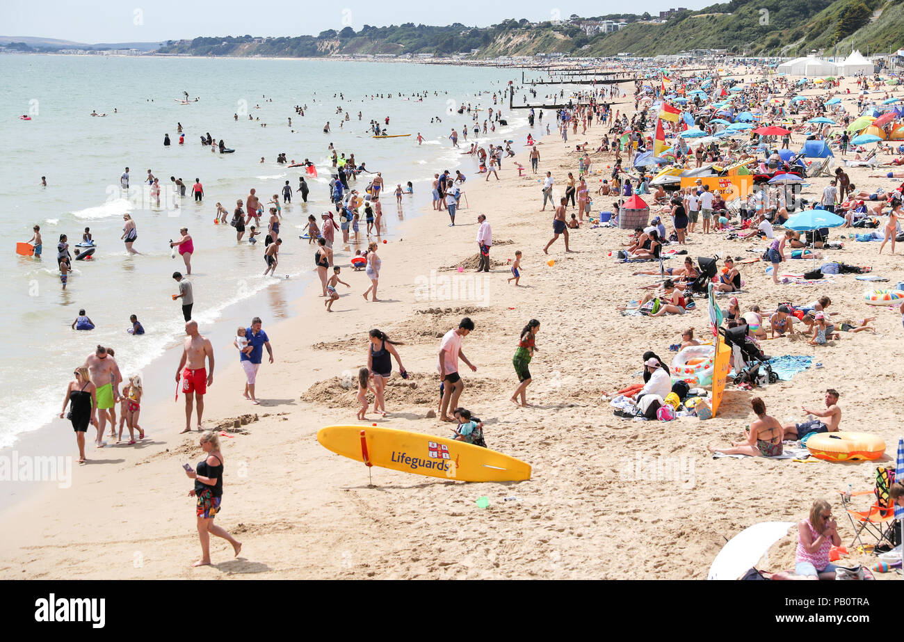 Heatwave Uk Beach Bournemouth Stock Photos & Heatwave Uk Beach ...