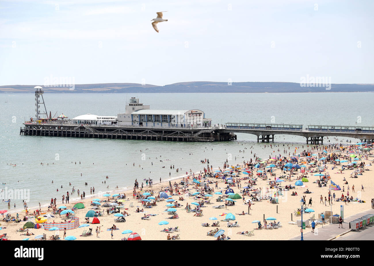 People enjoying the heatwave today on Bournemouth beach in Dorset as ...