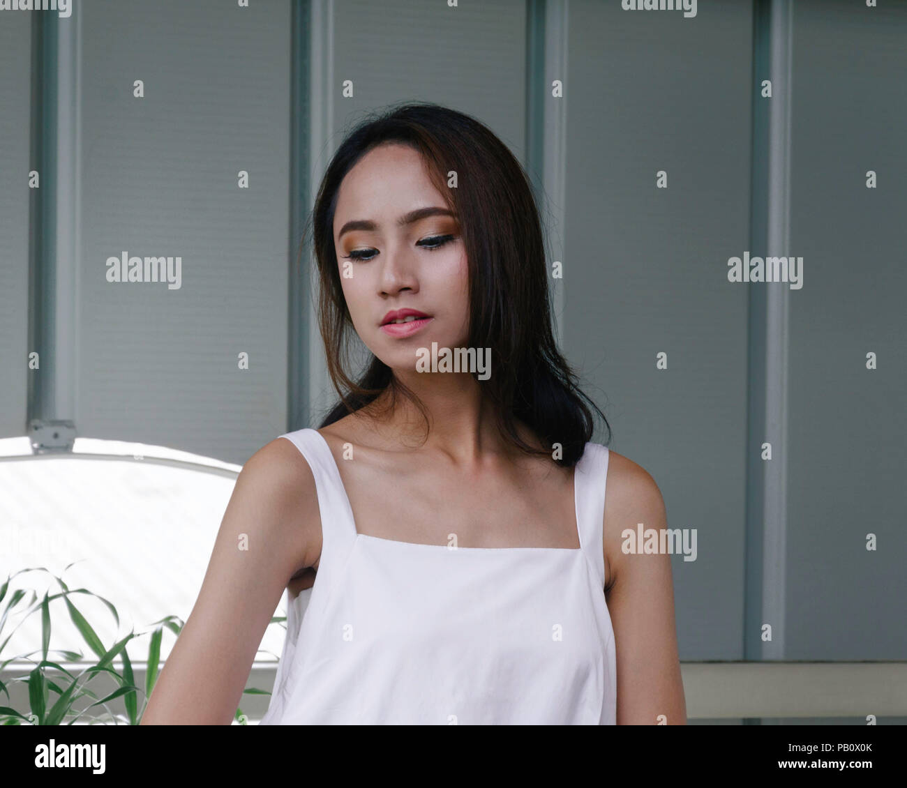 portrait of a lady on studio set Stock Photo - Alamy