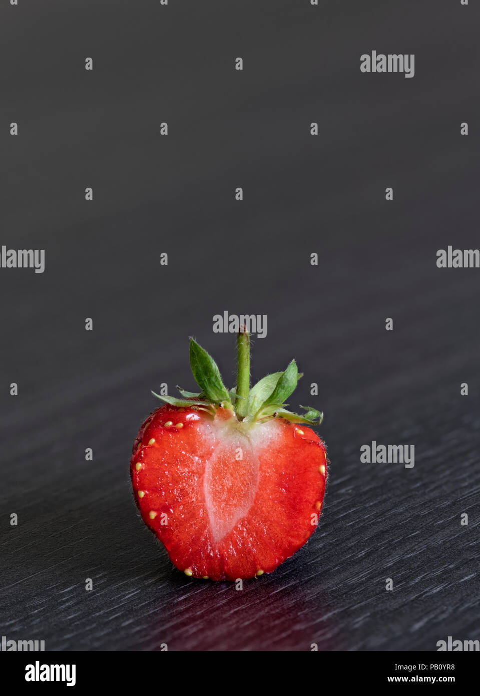 Strawberry cut in half hi-res stock photography and images - Alamy