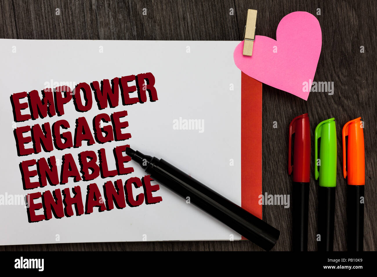 Writing note showing Empower Engage Enable Enhance. Business photo ...