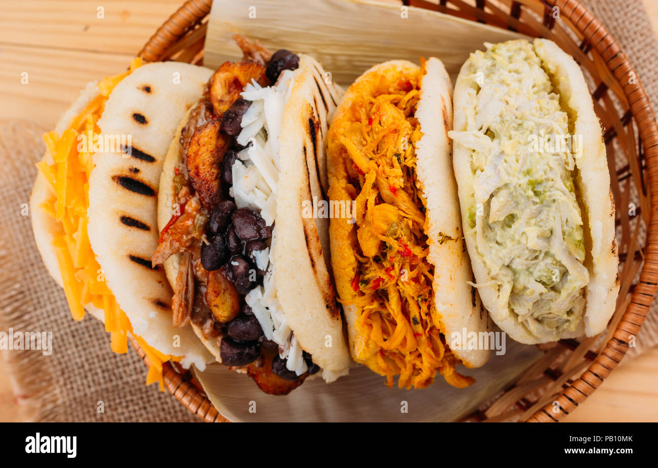 Combination of the typical South American Arepas in a woven basket ...