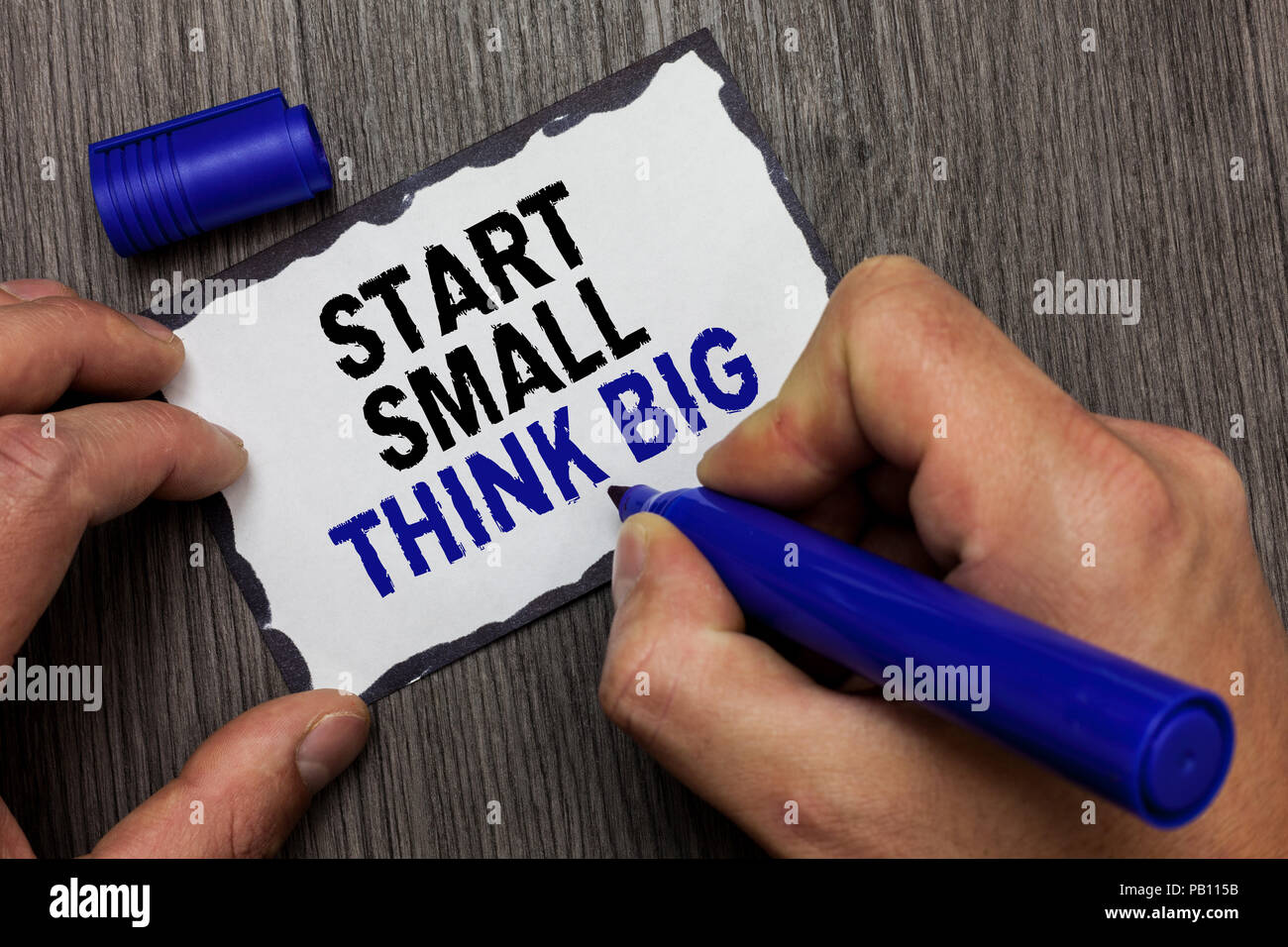 Handwriting text Start Small Think Big. Concept meaning Initiate with ...