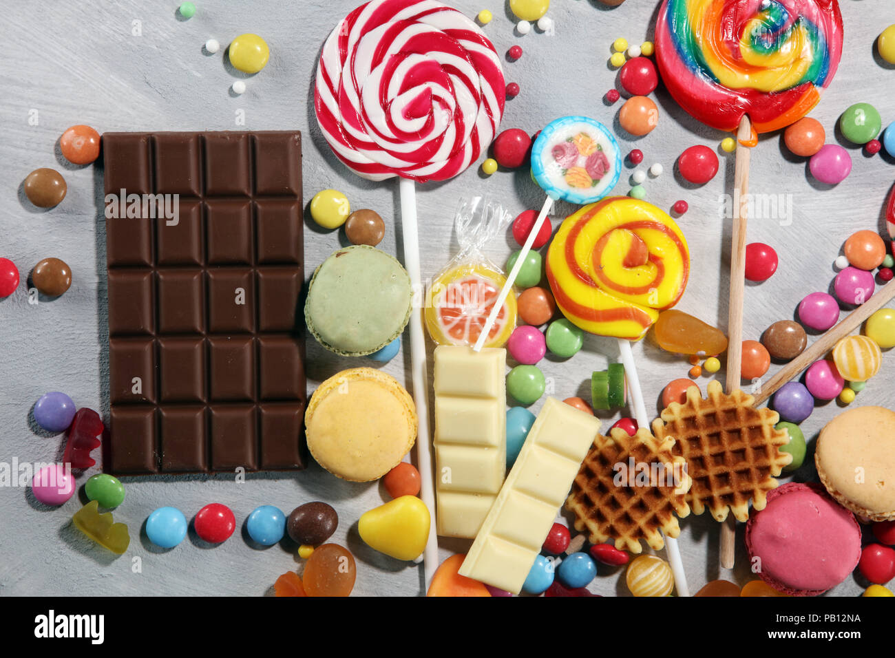 candies with jelly and sugar. colorful array of different childs sweets ...