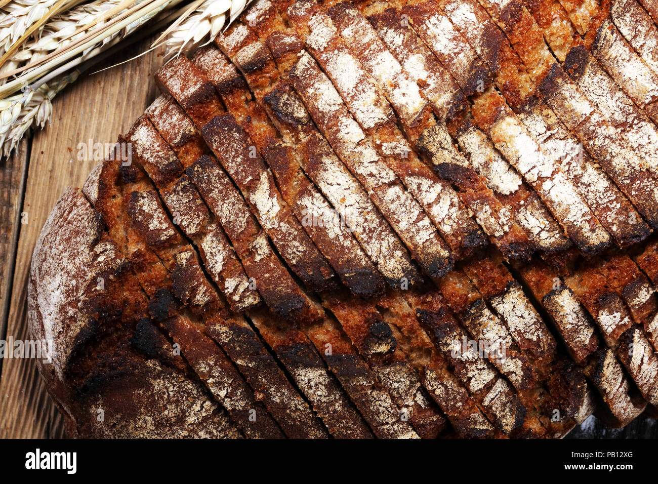 bread cutted on board from above. Kitchen or bakery poster design Stock ...