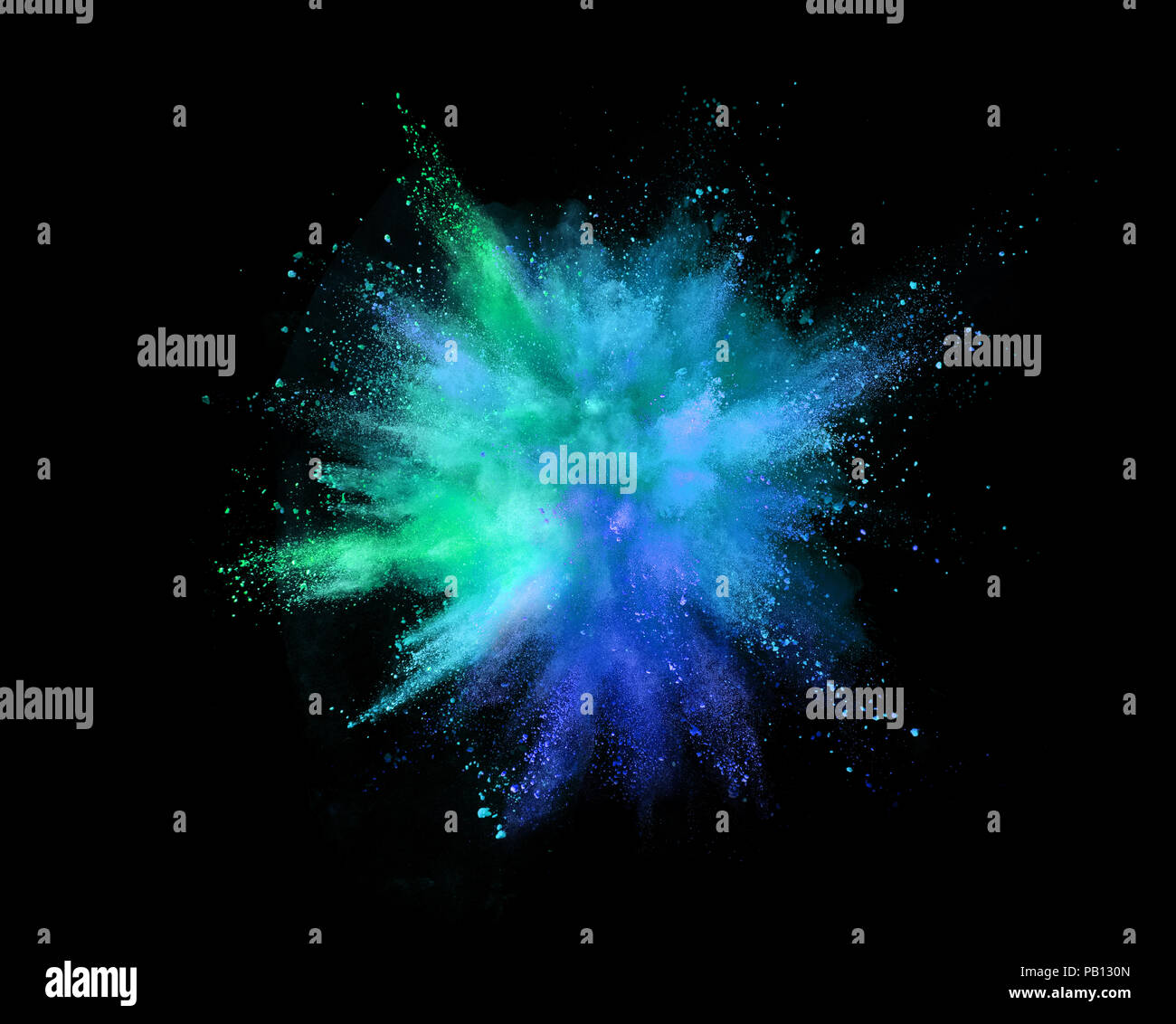 Explosion of coloured powder isolated on black background. Abstract ...