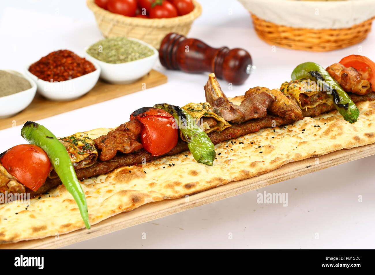 Mixed kebab plate, Turkish lahmacun, adana shish kebab, chicken meat ...