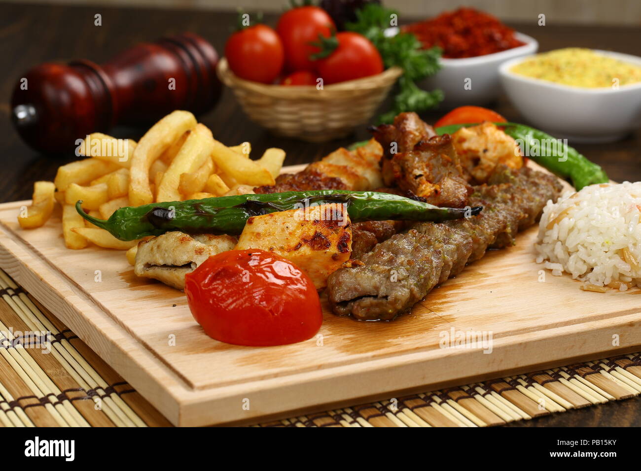 Mixed kebab plate, Turkish lahmacun, adana shish kebab, chicken meat ...