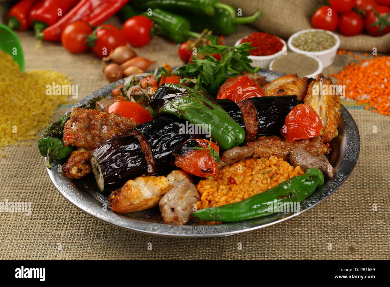 Mixed kebab plate, Turkish lahmacun, adana shish kebab, chicken meat ...
