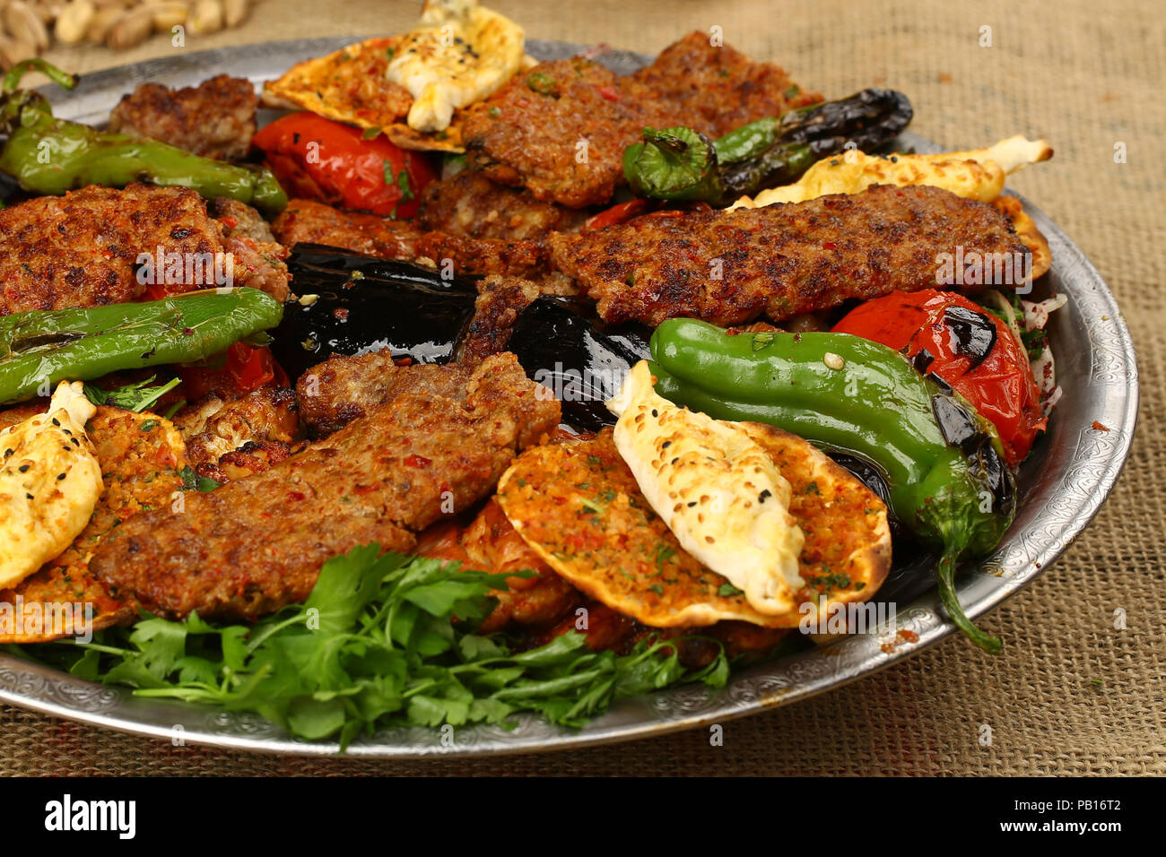 Mixed kebab plate, Turkish lahmacun, adana shish kebab, chicken meat ...