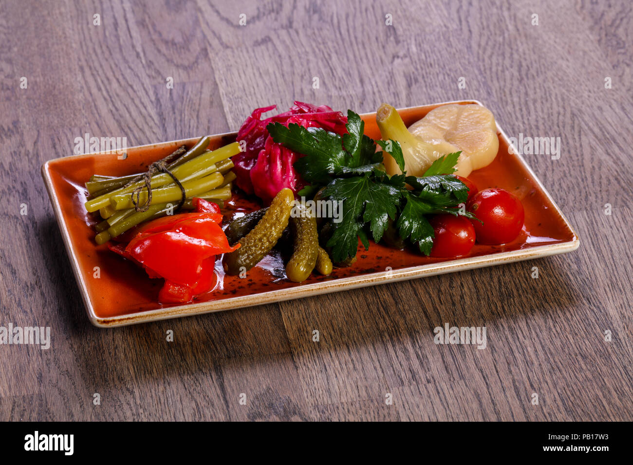 Pickled vegetables plate mix with parsley Stock Photo - Alamy