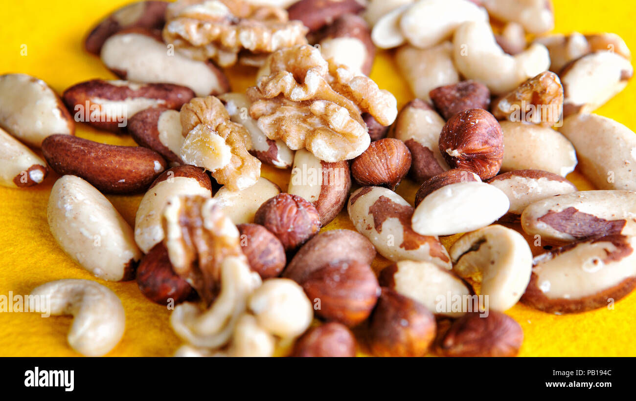 Group of mixed nuts hi-res stock photography and images - Alamy