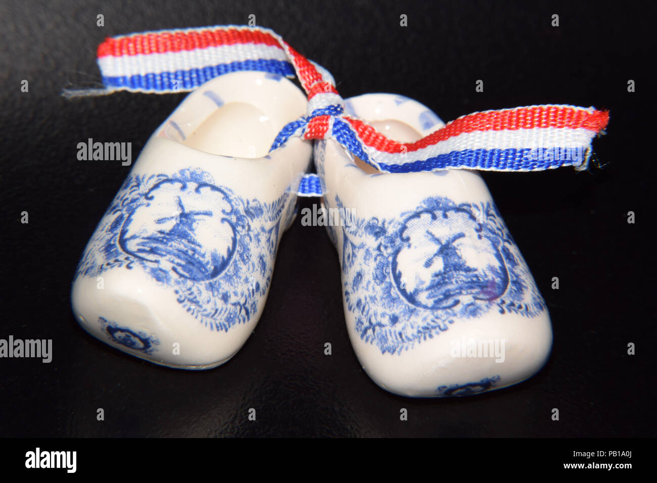 Dutch traditional shoes - Wooden clogs in porcellain decorated with ...