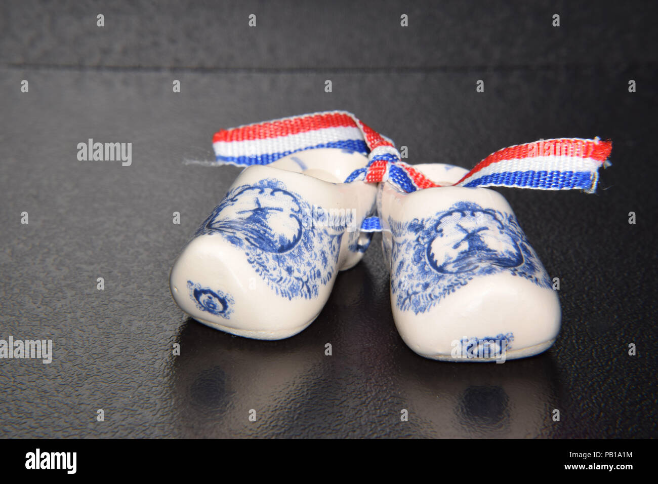 Dutch traditional shoes - Wooden clogs in porcellain decorated with ...