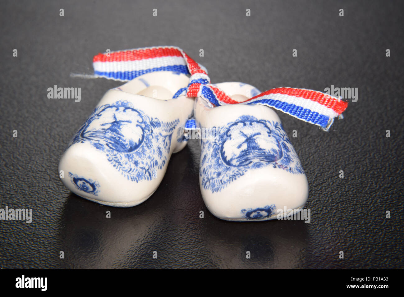Dutch traditional shoes - Wooden clogs in porcellain decorated with ...
