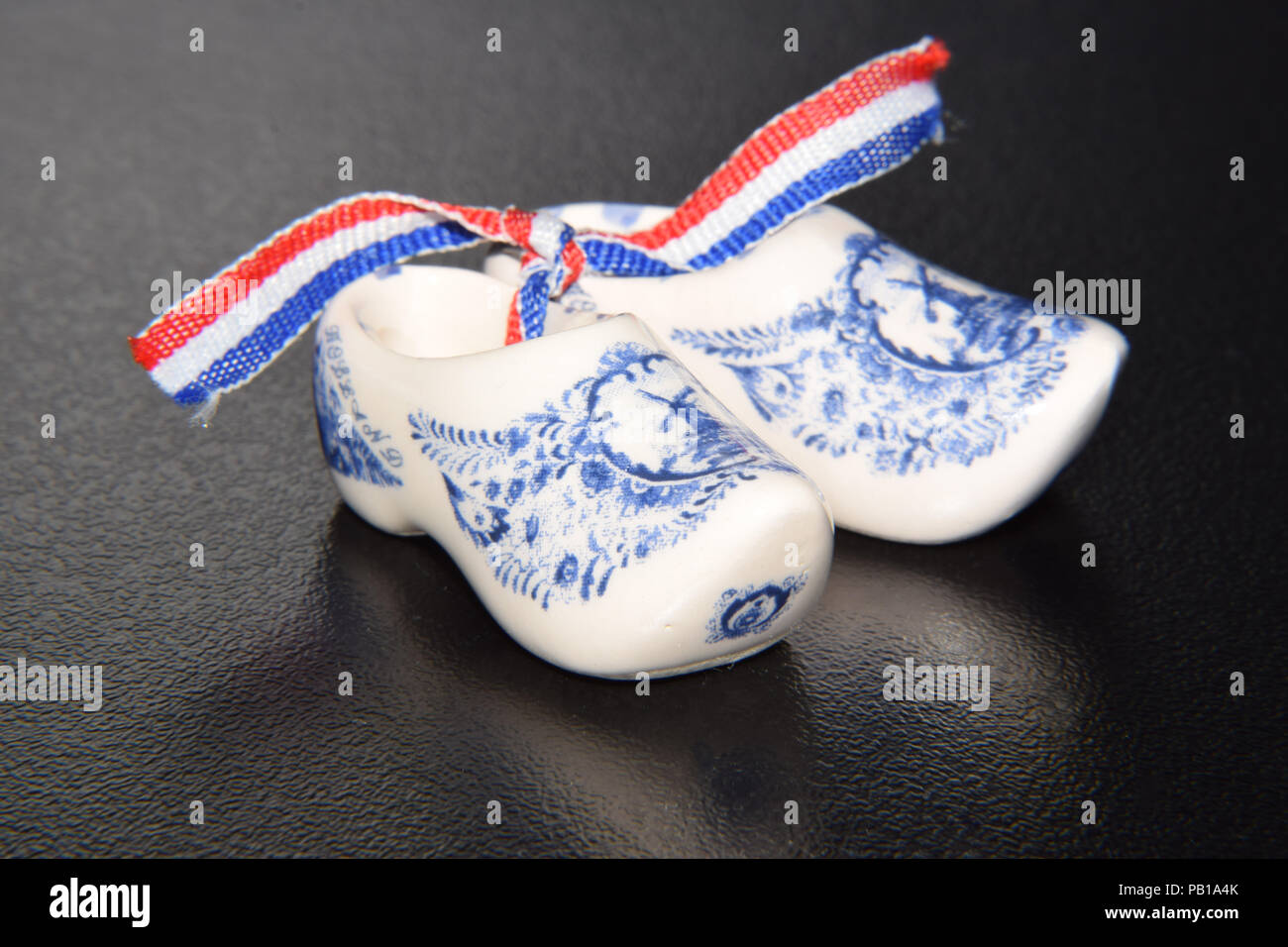 Dutch traditional shoes - Wooden clogs in porcellain decorated with ...
