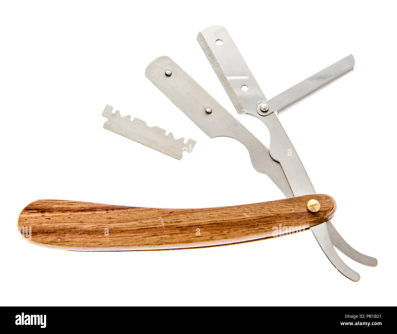 A straight razor with a wood handle opened up to replace the blade on ...