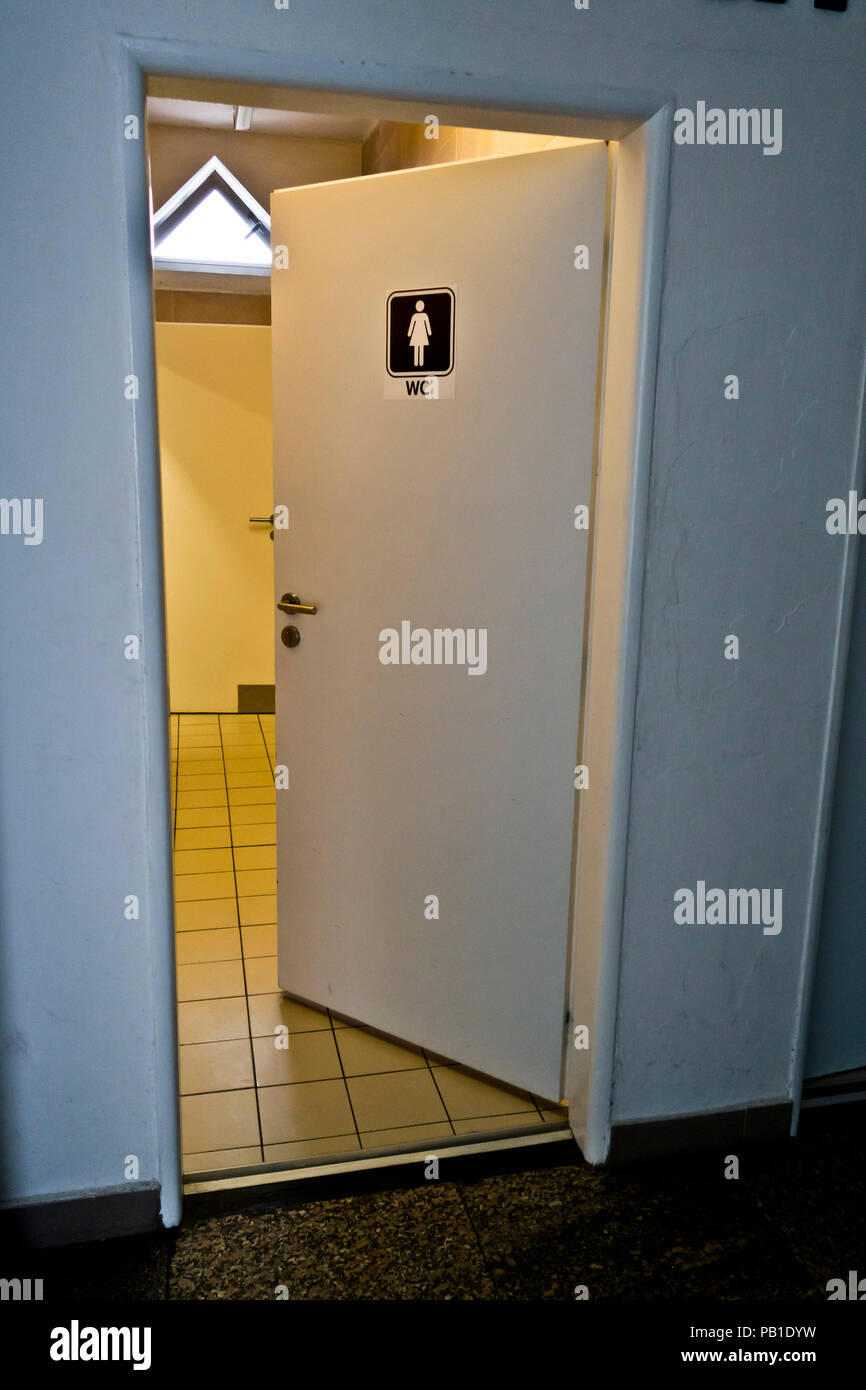 open door of a WC for women Stock Photo - Alamy
